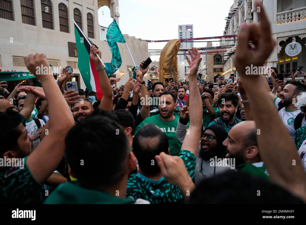 Saudi Arabian soccer fans cheer for their teams at Souq Waqif during ...