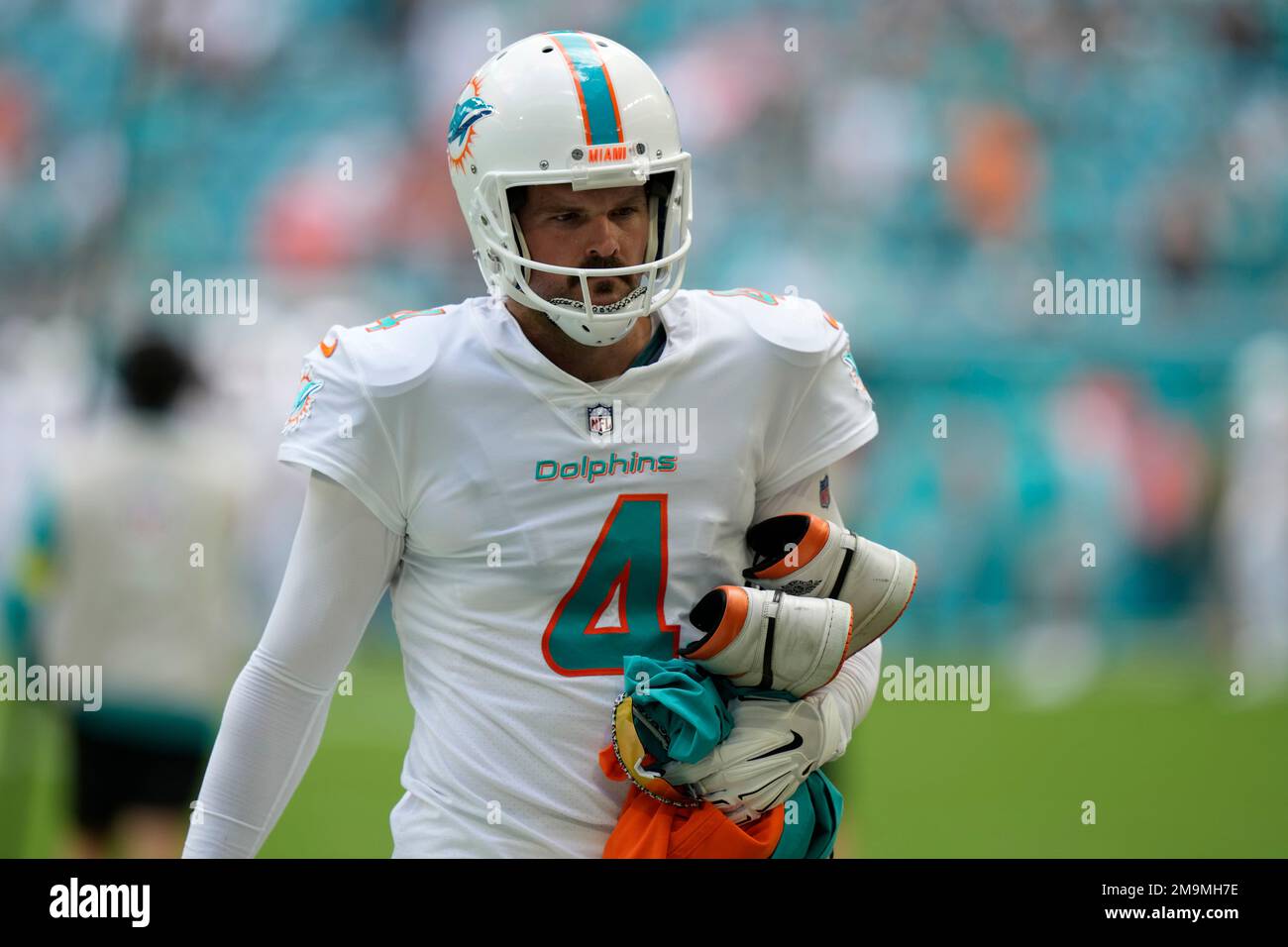 Miami Dolphins punter Thomas Morstead (4) walks off the field before an ...
