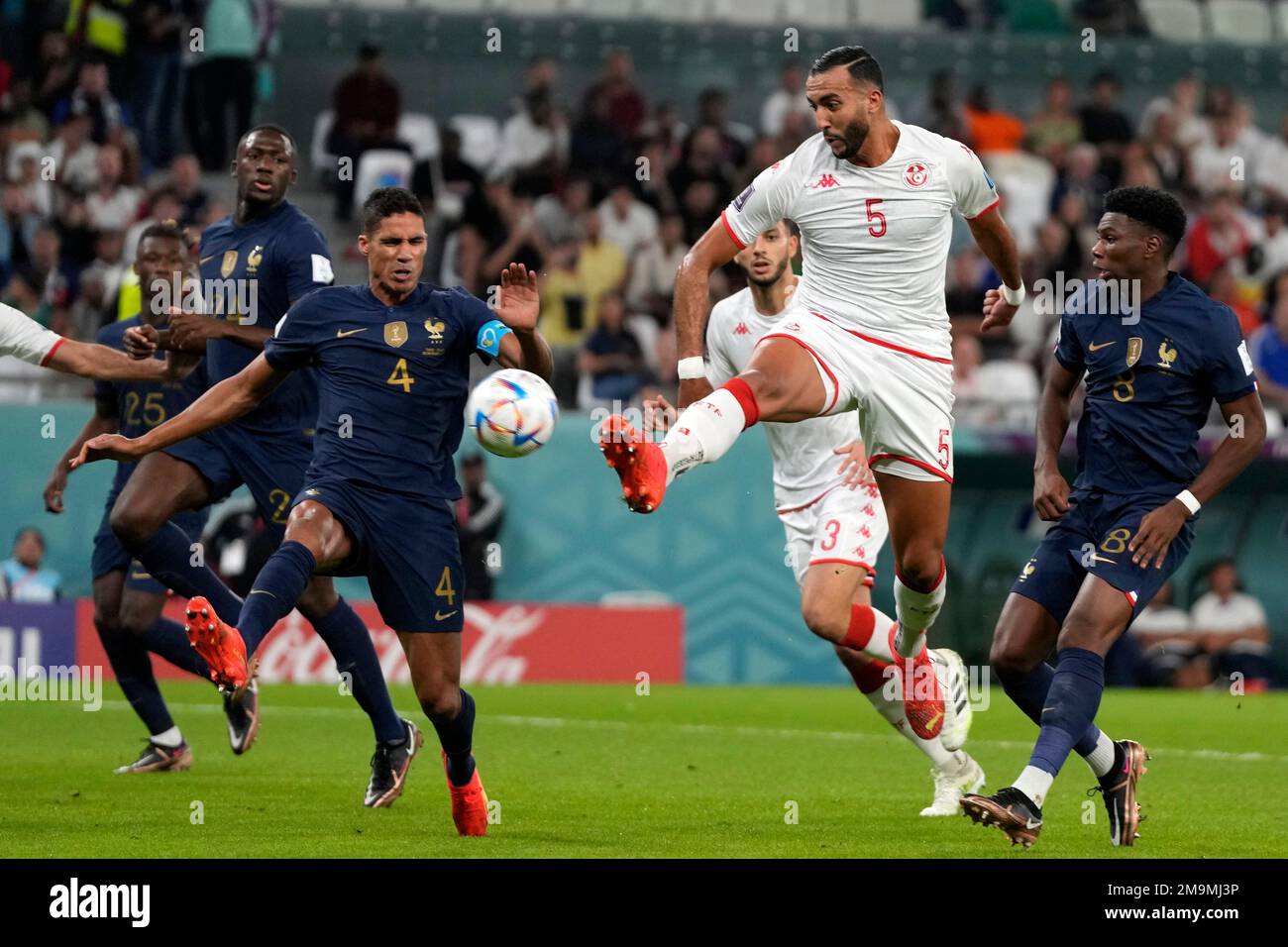 Tunisia's Nader Ghandri jumps for the ball during the World Cup group D ...