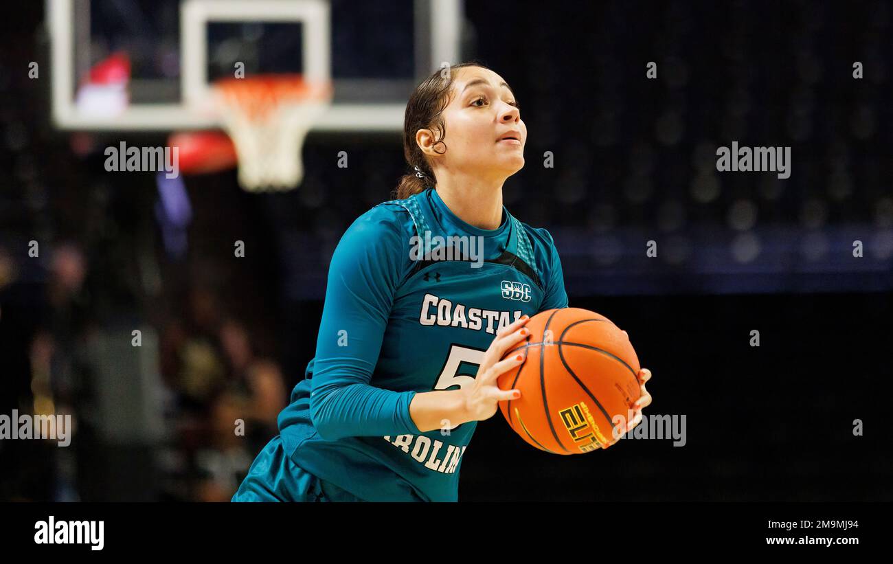 Coastal Carolina's Deaja Richardson (5) handles the ball during an NCAA ...