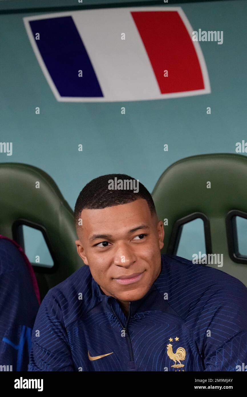 France's Kylian Mbappe sits at the substitutes bench before the World ...