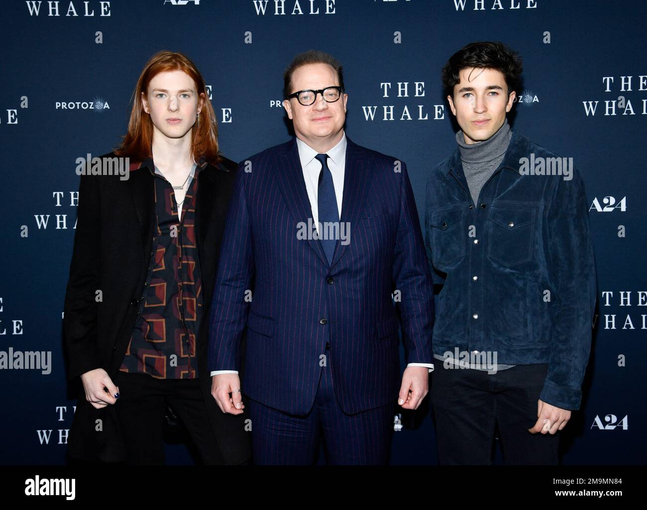 Actor Brendan Fraser, center, poses with his sons Leland Fraser, left ...