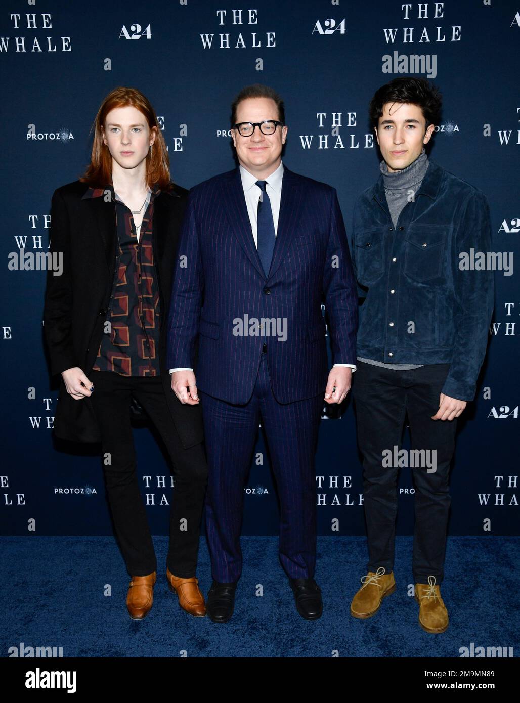 Actor Brendan Fraser, center, poses with his sons Leland Fraser, left ...