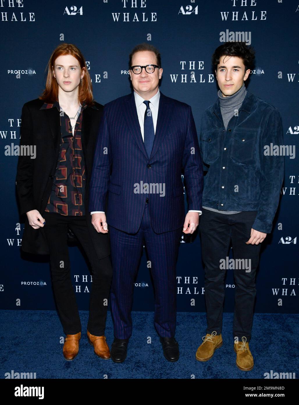 Actor Brendan Fraser, center, poses with his sons Leland Fraser, left ...