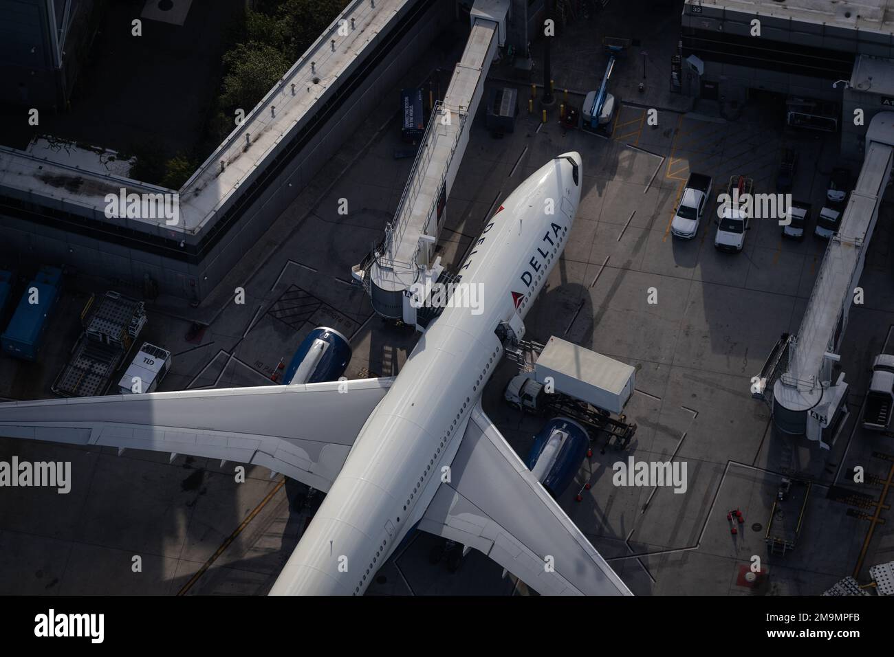 An aerial view of a Delta Airlines Airbus 330 Neo at a gate at an ...