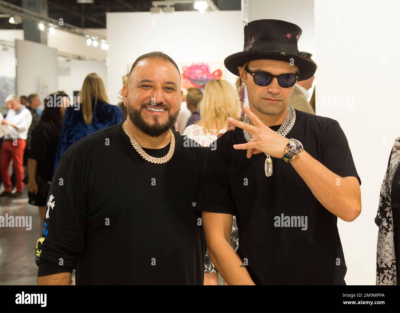David Einhorn, left, and artist Alec Monopoly attend Art Basel 2022 on ...