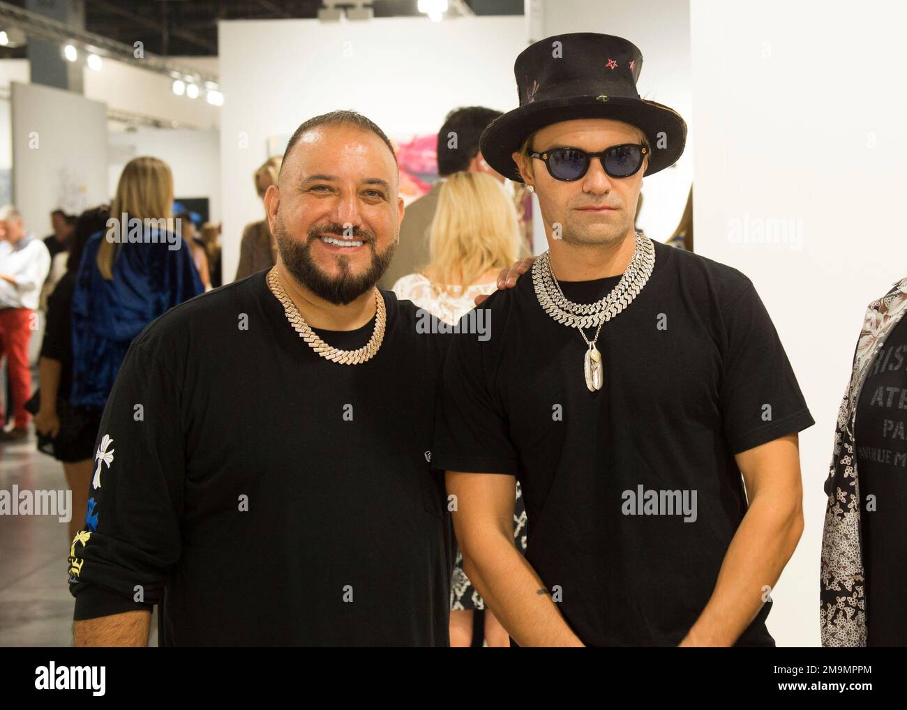 David Einhorn, left, and artist Alec Monopoly attend Art Basel 2022 on ...