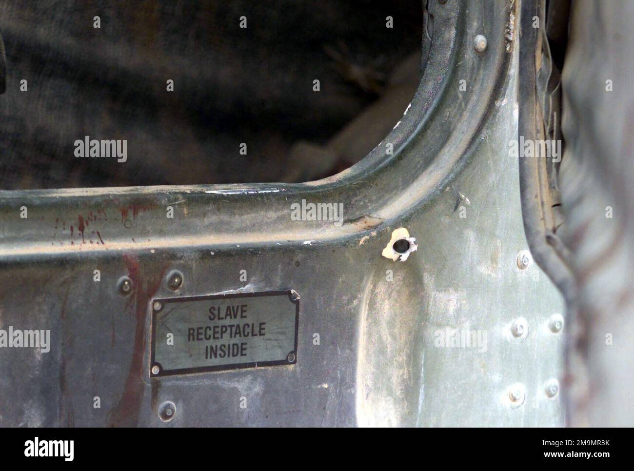 Small arms bullet hole damage to a United States military vehicle in ...