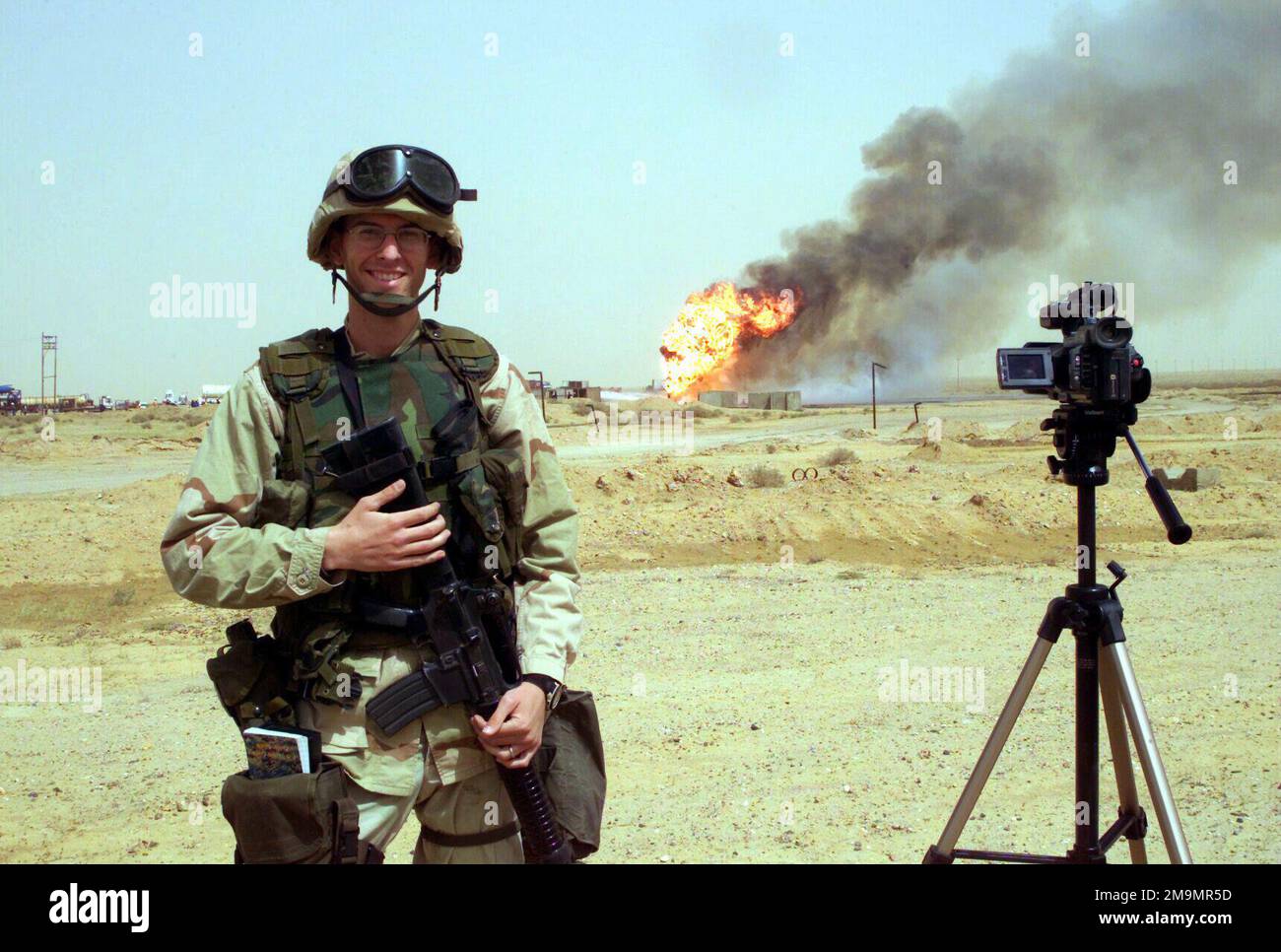 Armed with a Colt 5.56 mm M16A2 Rifle, US Marine (USMC) Sergeant (SGT ...