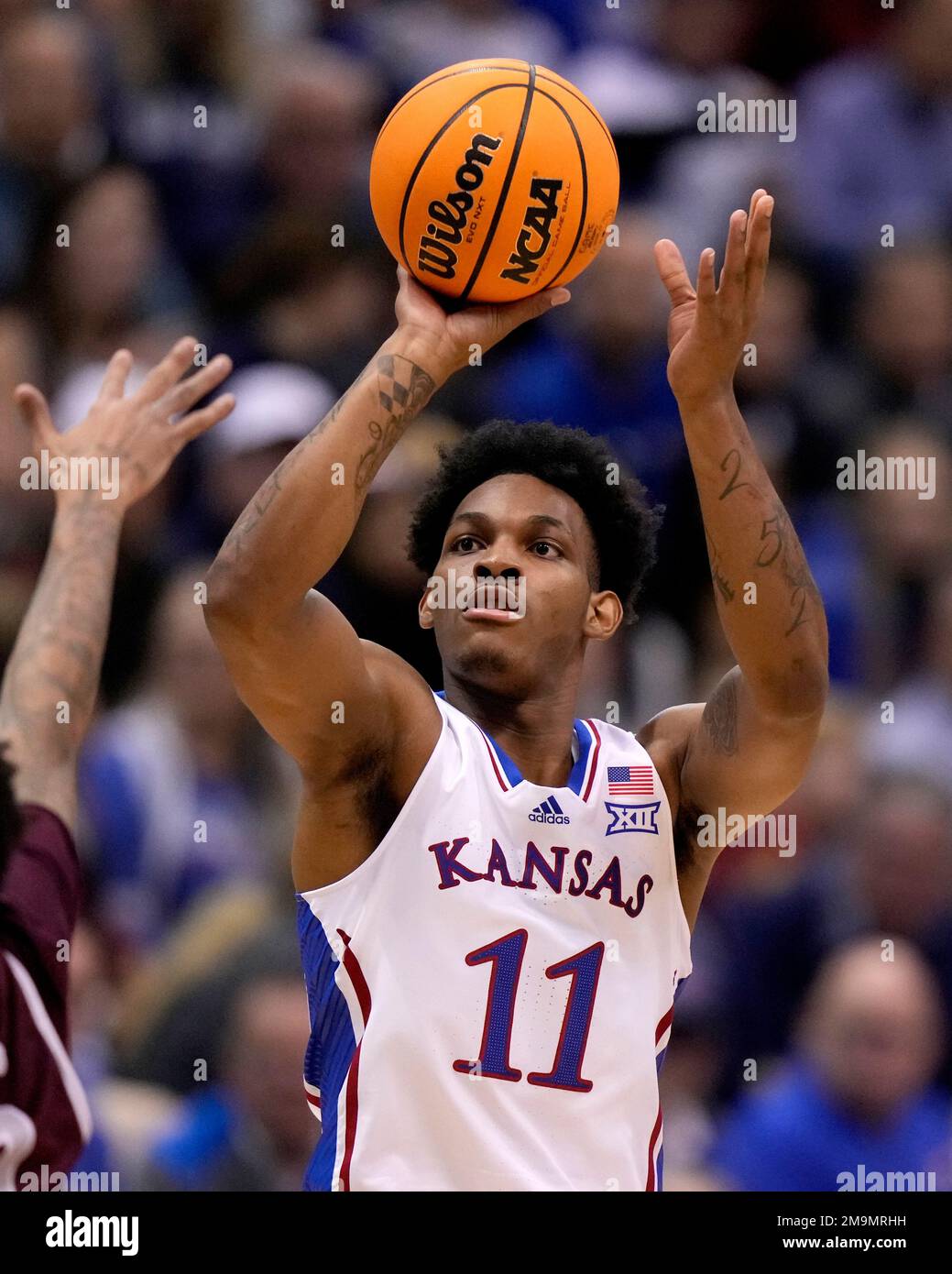 Kansas guard MJ Rice shoots during the second half of an NCAA college ...