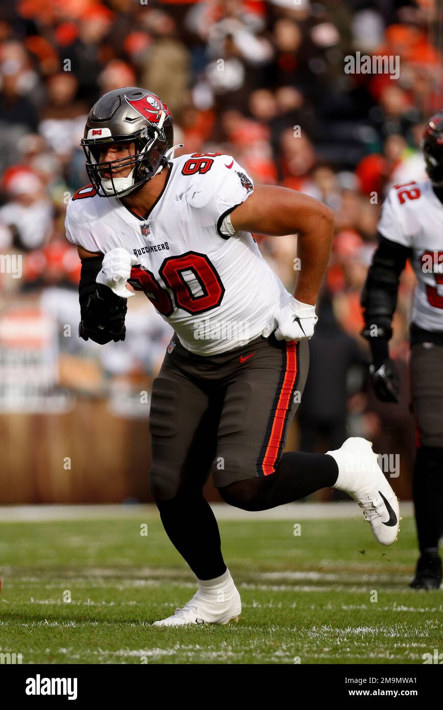 Tampa Bay Buccaneers defensive end Logan Hall (90) runs off of the line ...