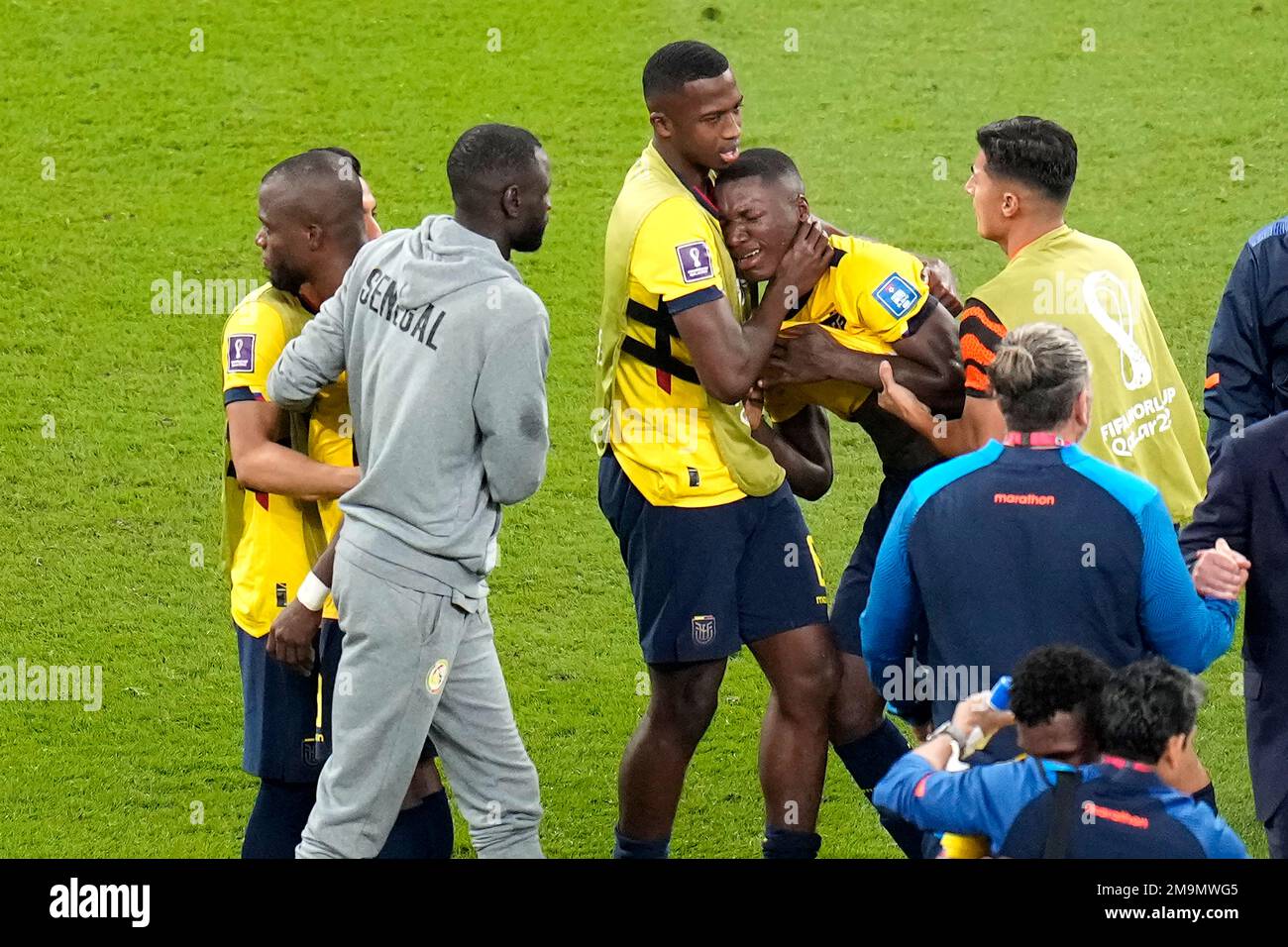 Ecuador's Moises Caicedo, second right, cries after their loss in the ...