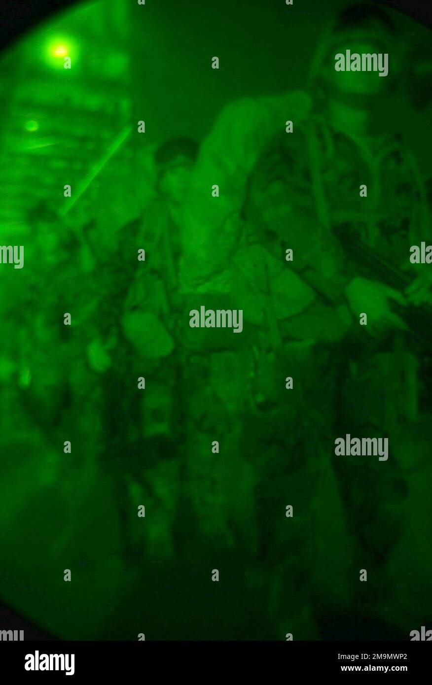 A night vision photo of US Marine Corps (USMC) members from Fox Company ...