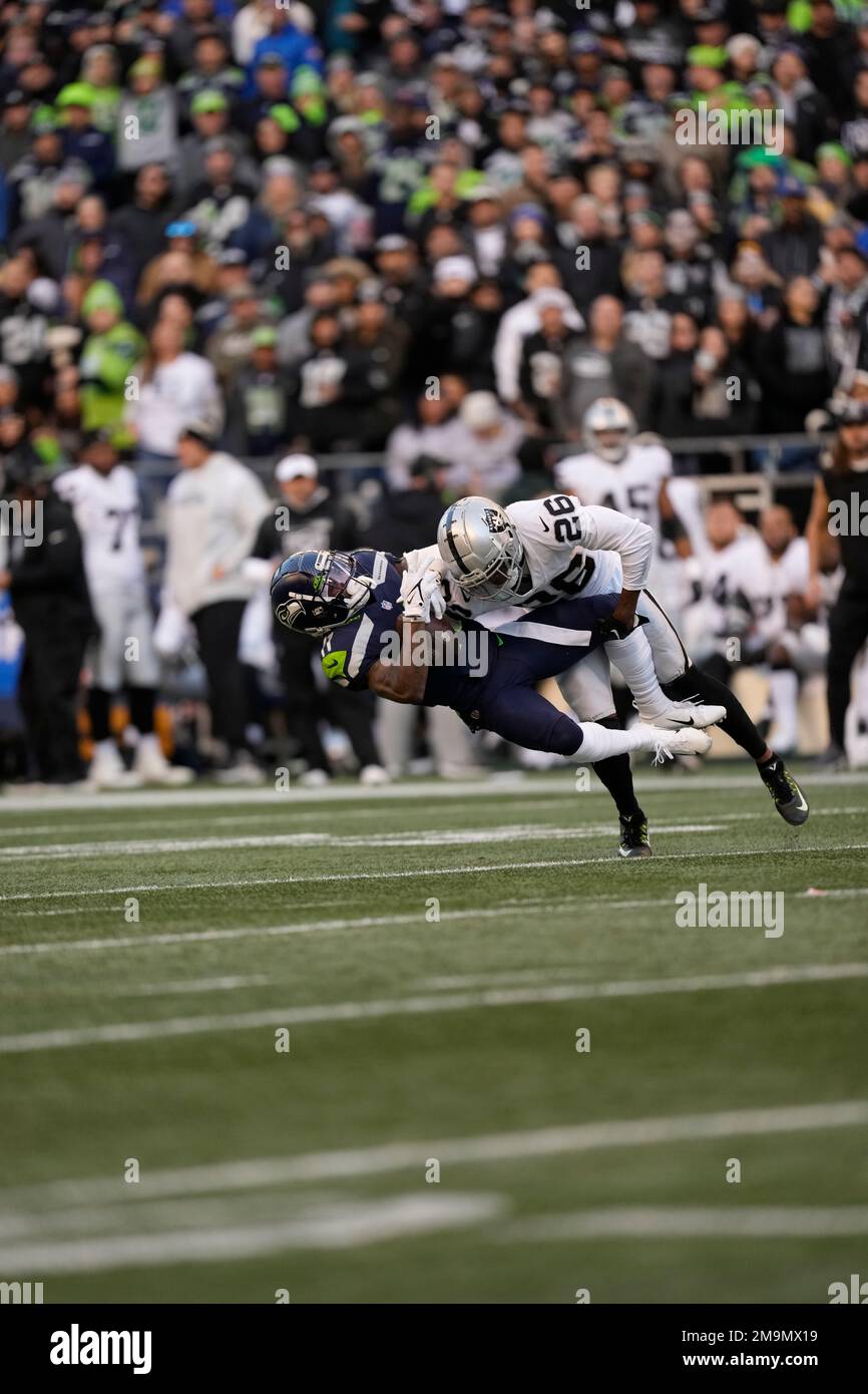 Las Vegas Raiders cornerback Rock Ya-Sin (26) tackles Seattle Seahawks ...