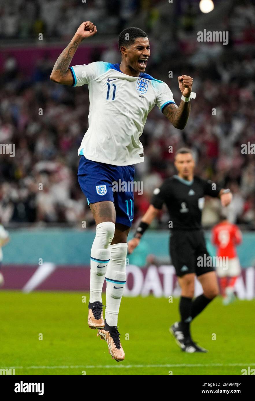 England's Marcus Rashford celebrates after scoring his side's second ...