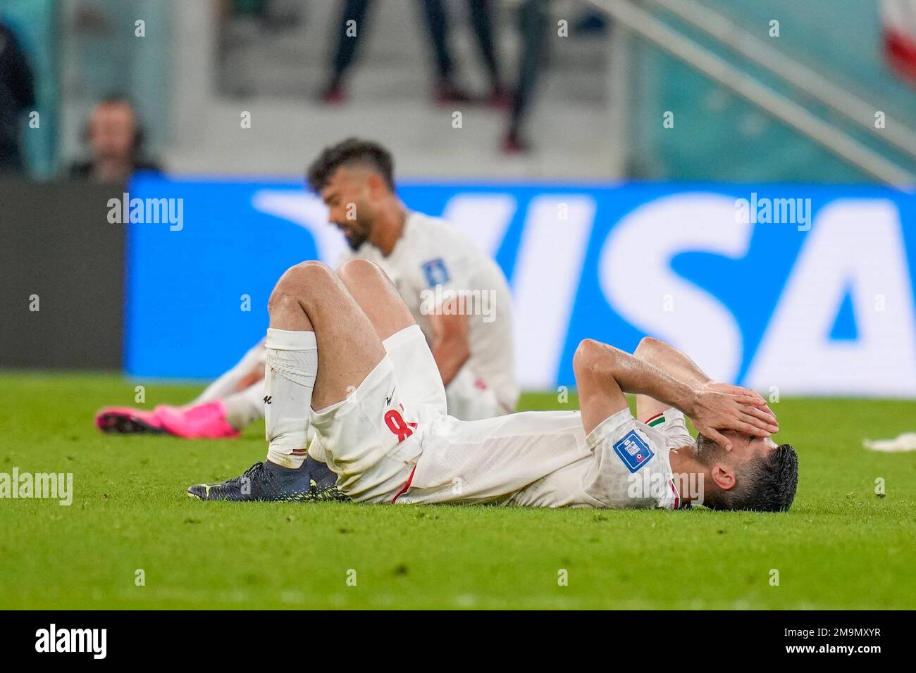 Iran's Ali Karimi is dejected after the World Cup group B soccer match ...