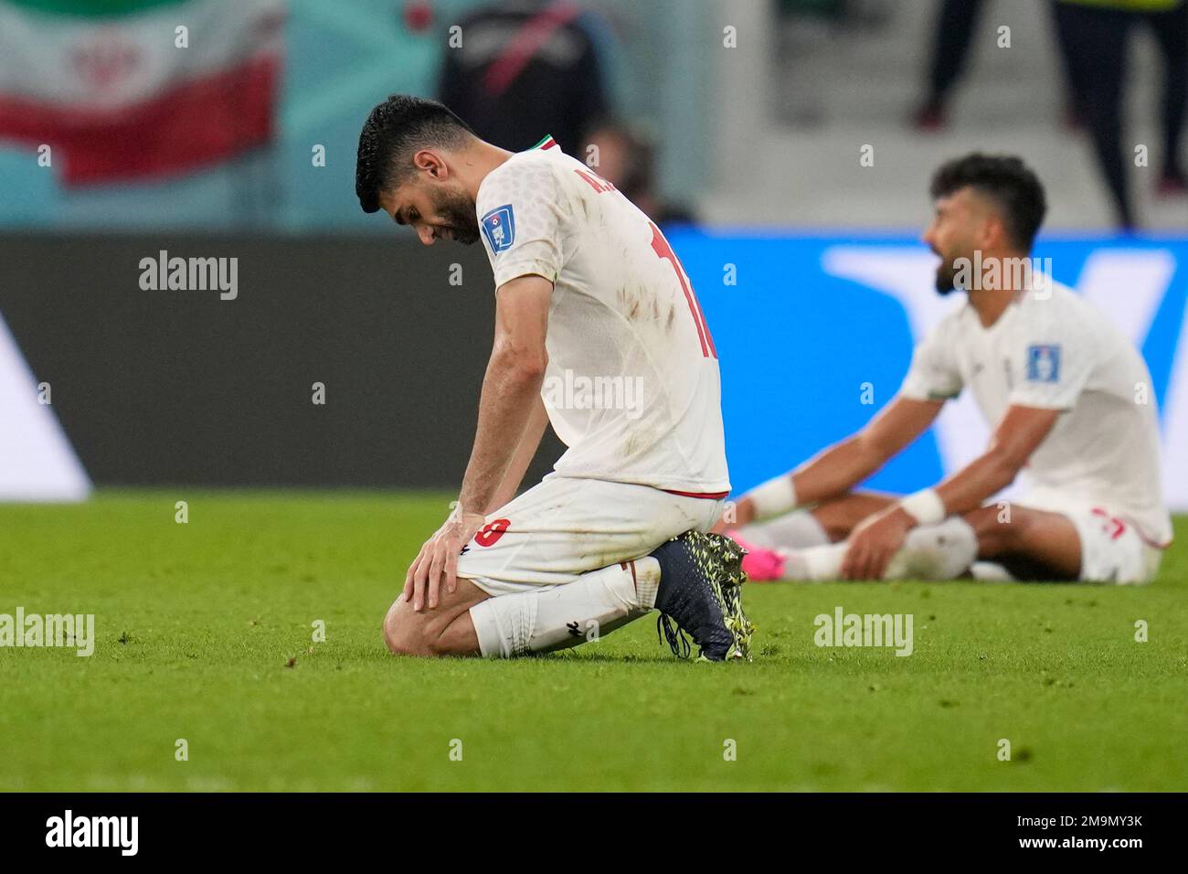 Iran's Ali Karimi is dejected after the World Cup group B soccer match ...