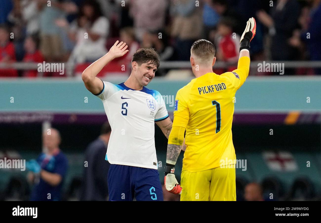 England's goalkeeper Jordan Pickford, right, and England's John Stones ...