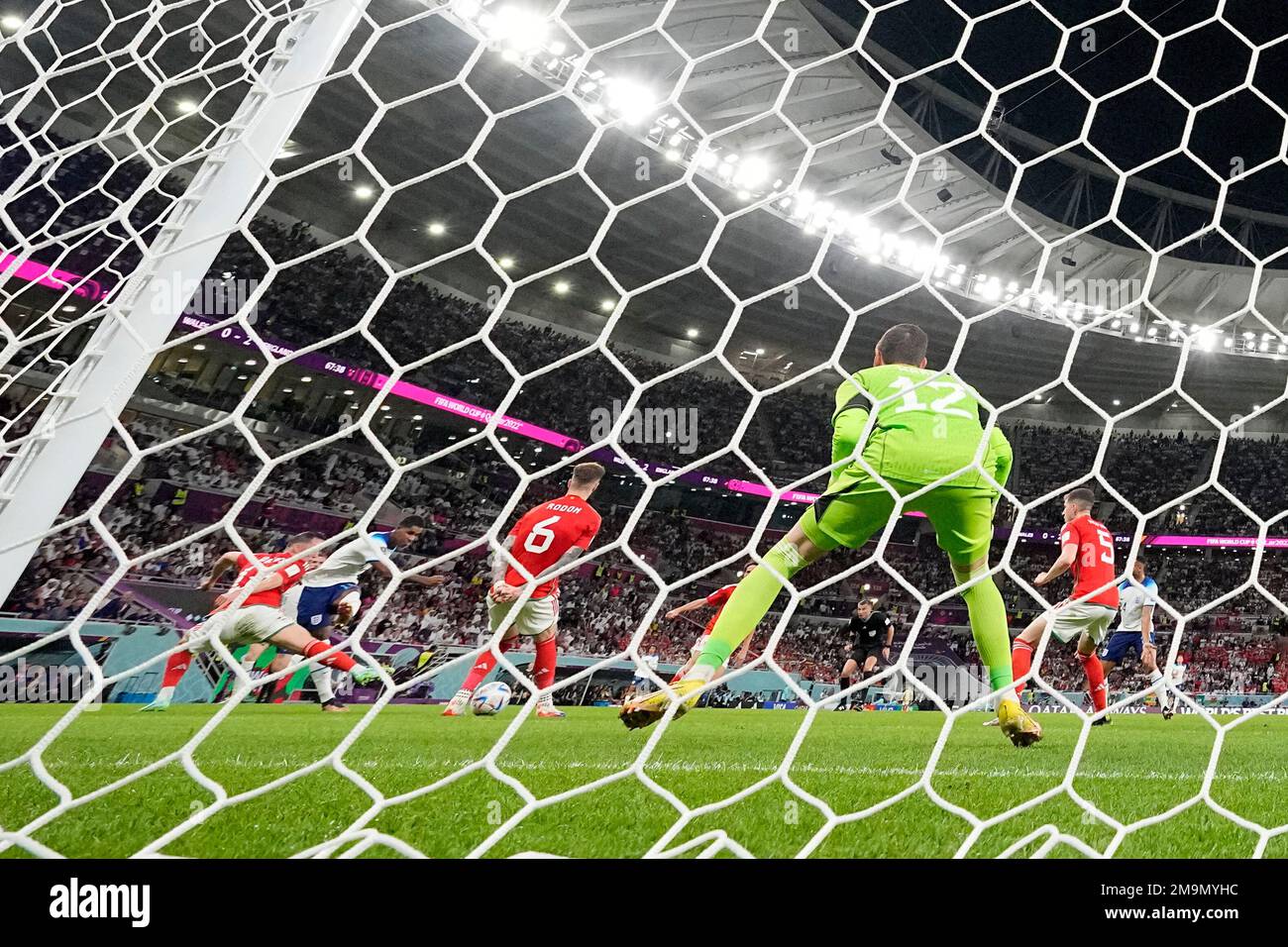England's Marcus Rashford scores his side's third goal during the World ...