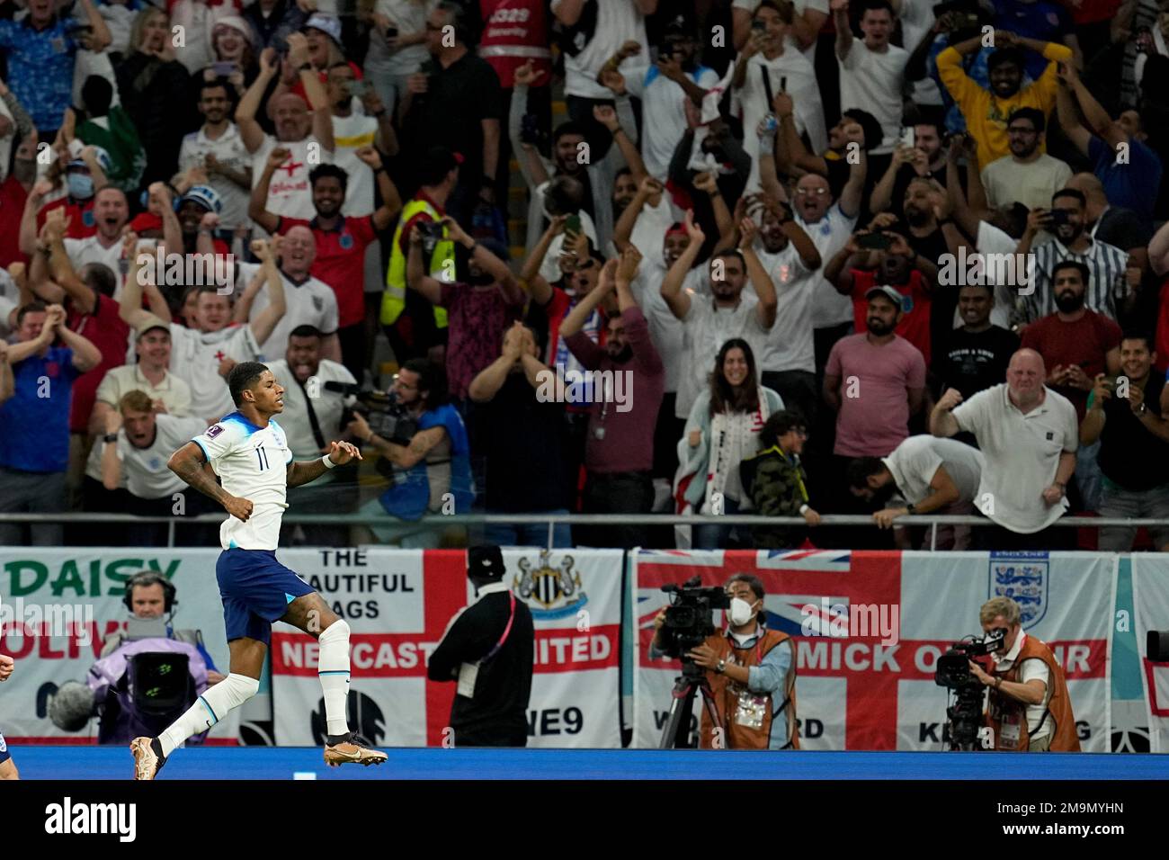 England's Marcus Rashford celebrates scoring the opening goal during ...