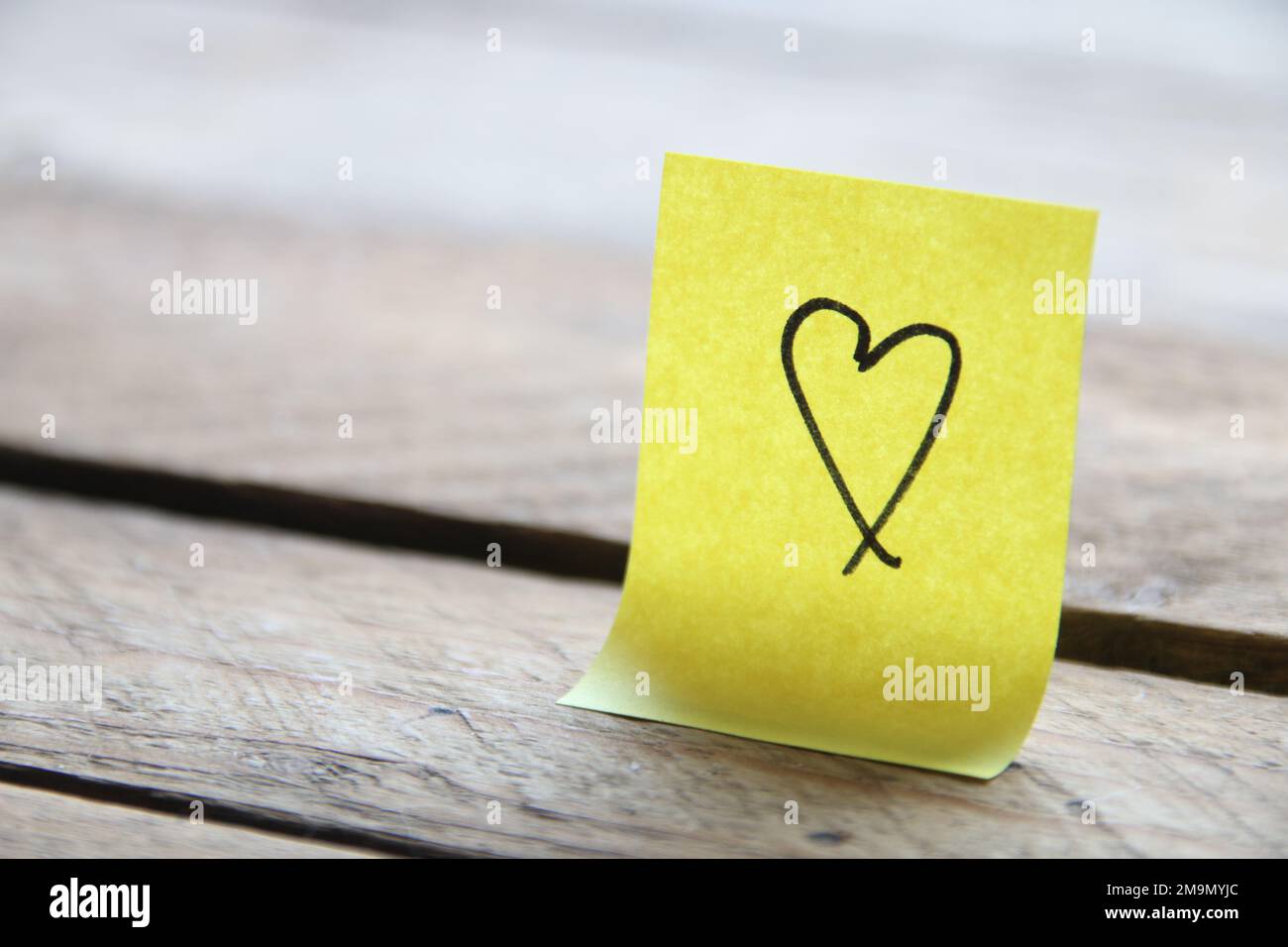 Heart on a paper tag. Birthday background. Valentine's Day concept ...