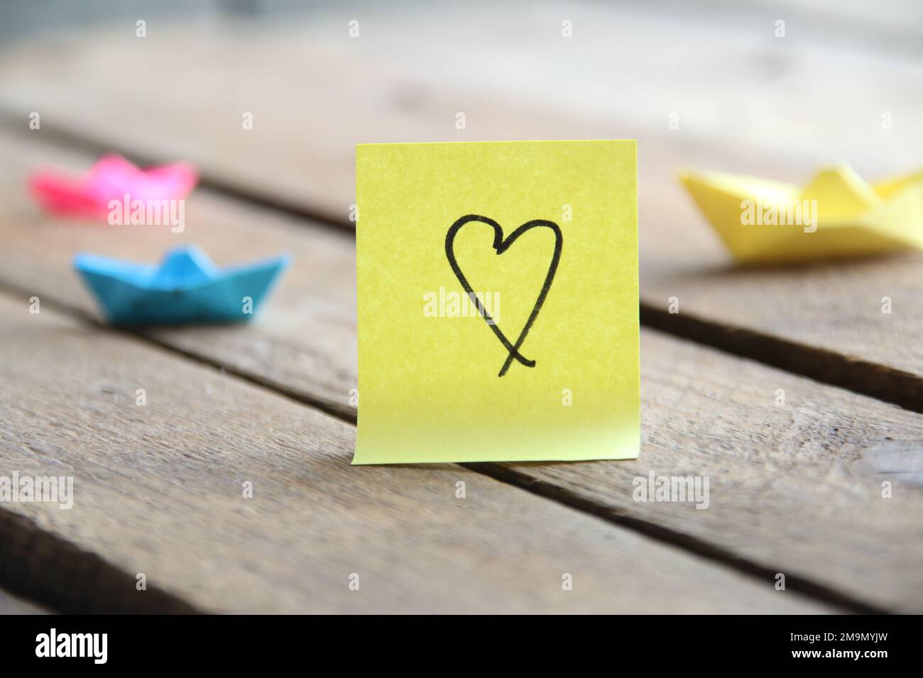 Heart on a paper tag. Birthday background. Valentine's Day concept ...