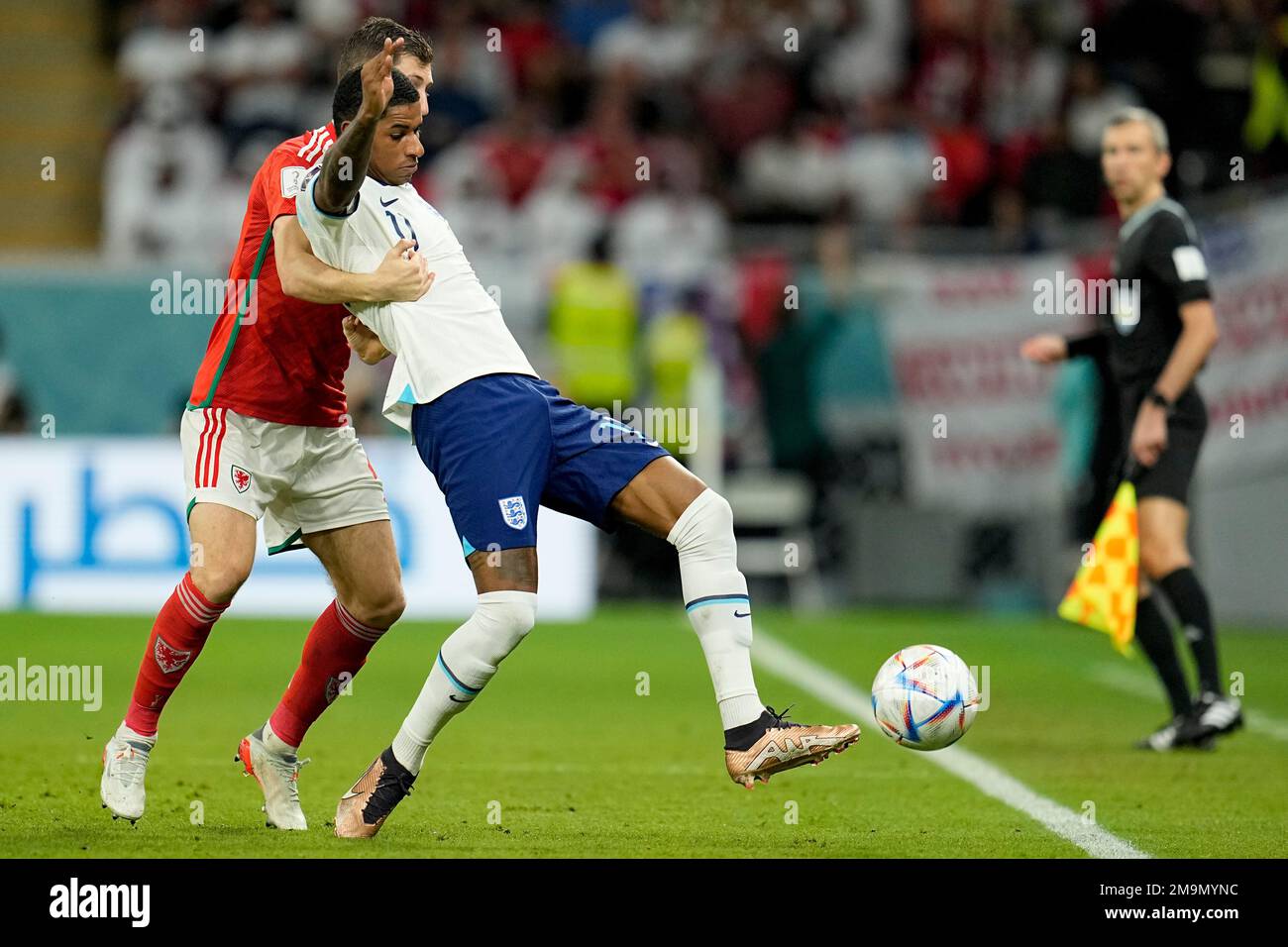 Wales' Ben Davies, left, and England's Marcus Rashford battle for the ...