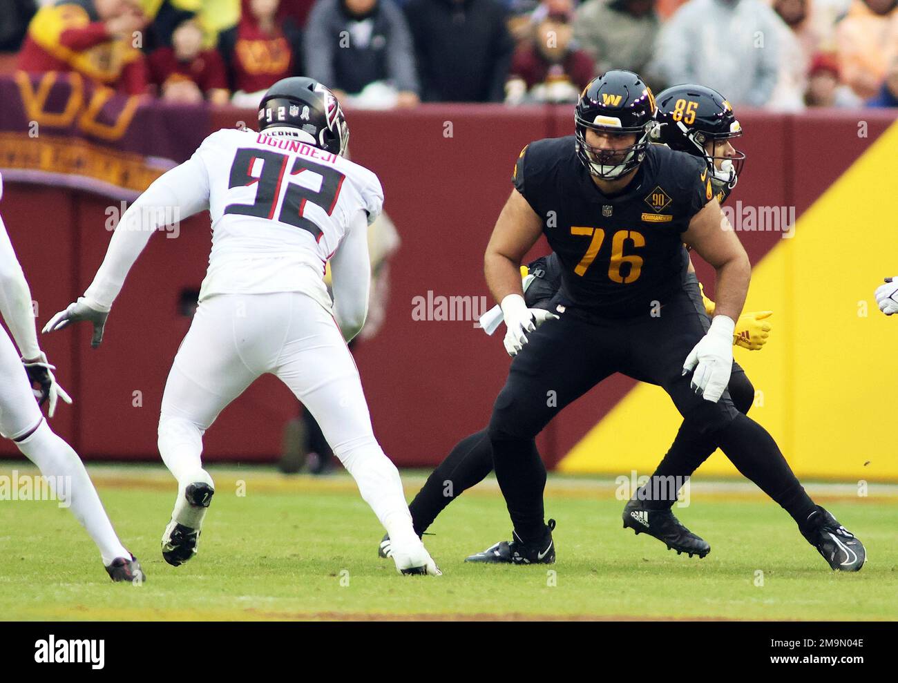 Washington Commanders offensive tackle Sam Cosmi (76) blocks during an ...