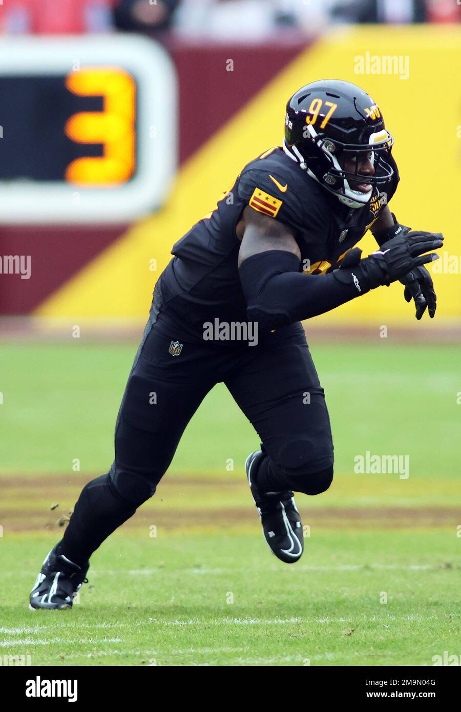 Washington Commanders defensive end Efe Obada (97) runs during an NFL ...