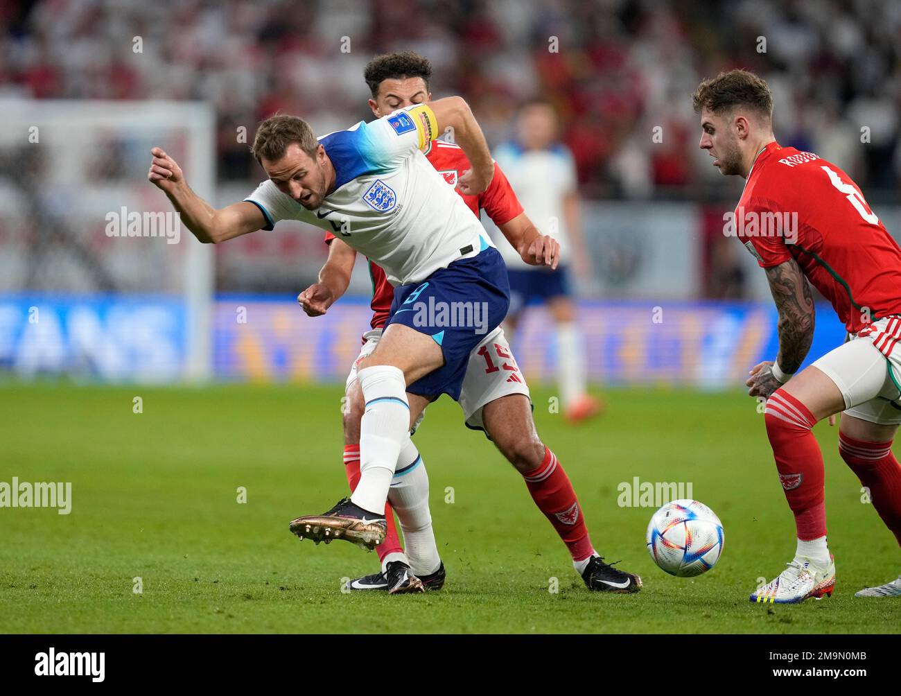 England's Harry Kane, center, kicks the ball during the World Cup group ...
