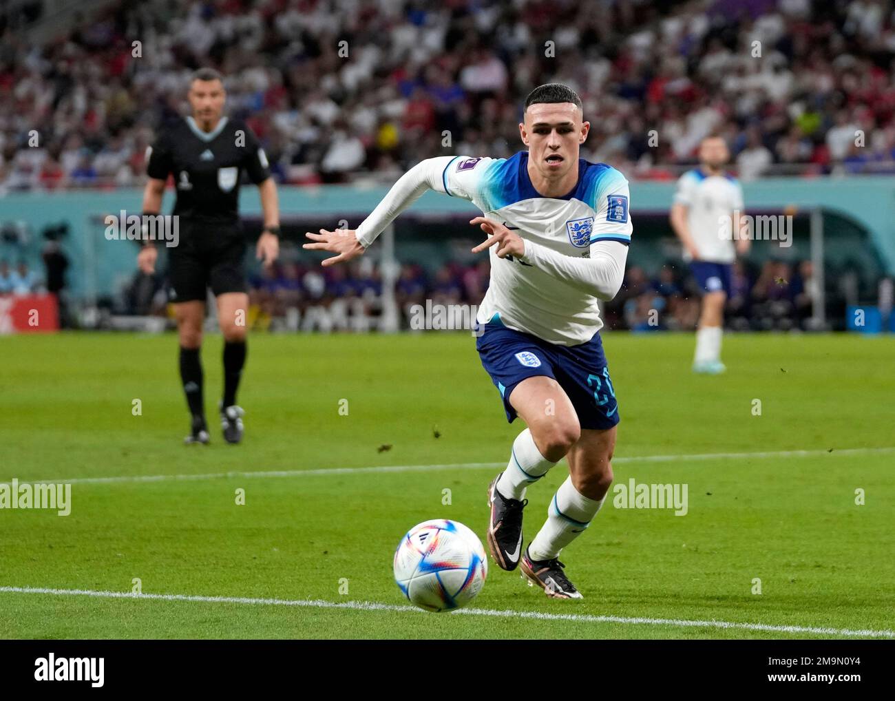 England's Phil Foden controls the ball during the World Cup group B ...