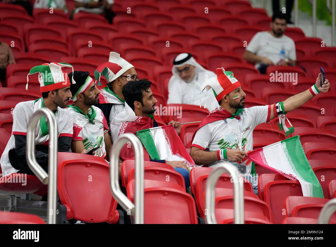 Iranian soccer fans pose for a selfie before the World Cup group B ...