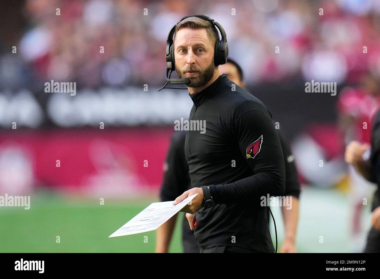 Arizona Cardinals head coach Kliff Kingsbury pauses on the sideline ...