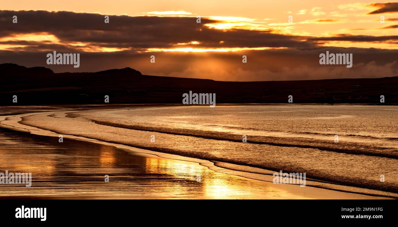 Golden sunset, ocean, mountains, beaches and cloudy skies, this is the ...