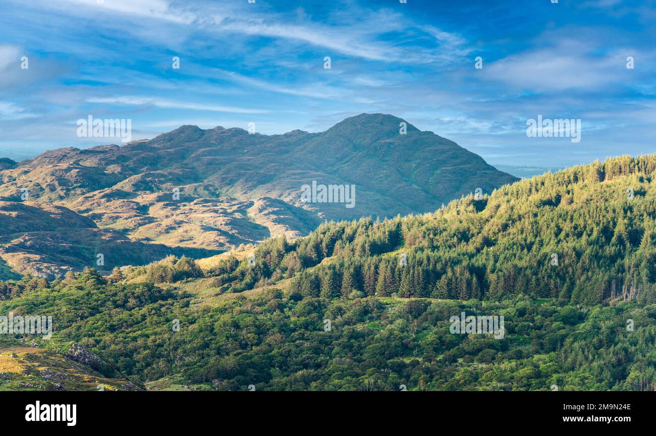 Clouds and green mountains with lakes, amazing nature of Ireland in ...