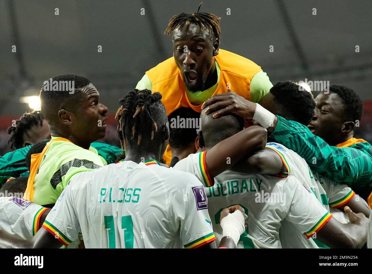 Senegal players celebrate scoring their side's second goal during the ...