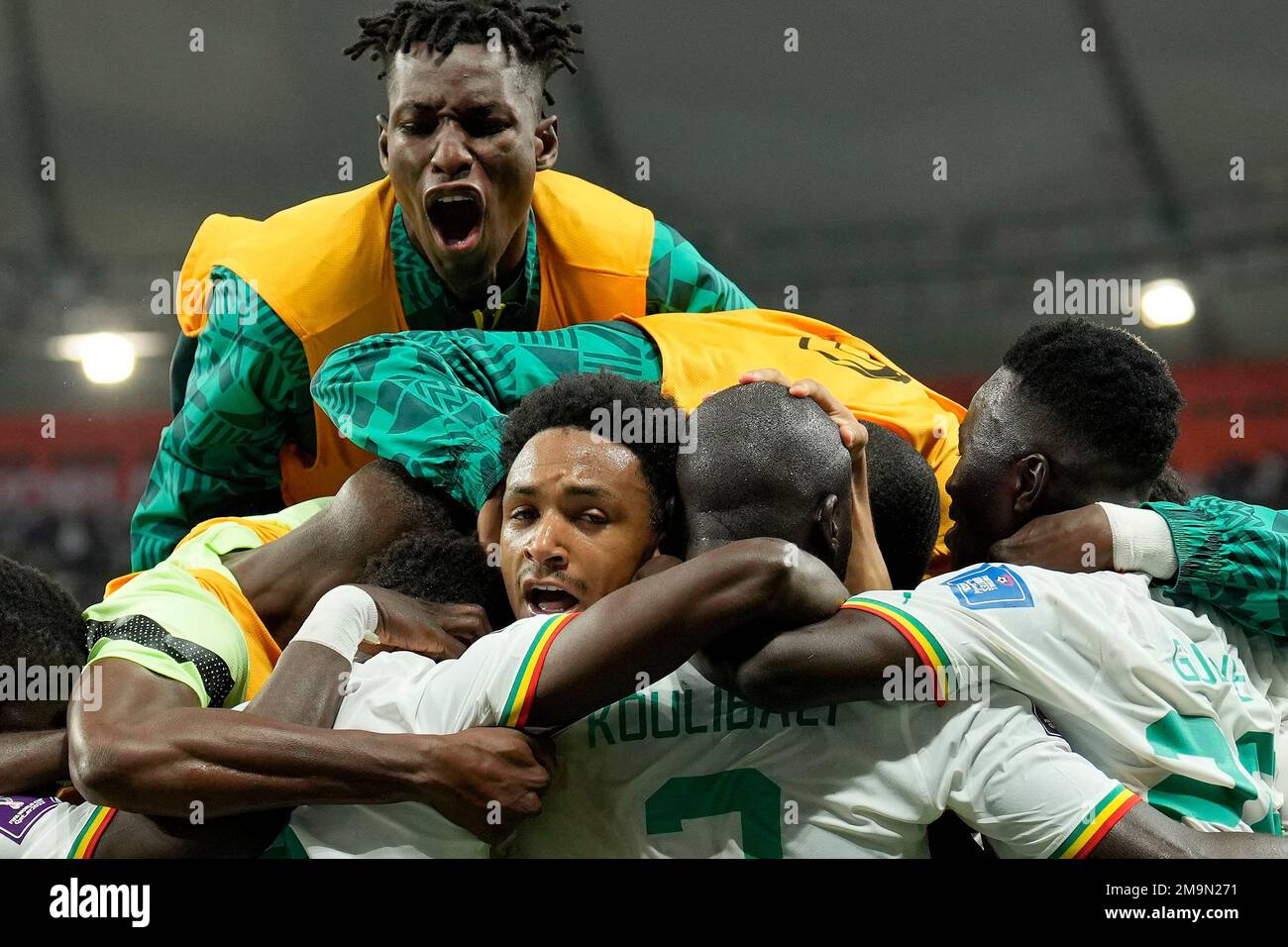 Senegal players celebrate scoring their side's second goal during the ...