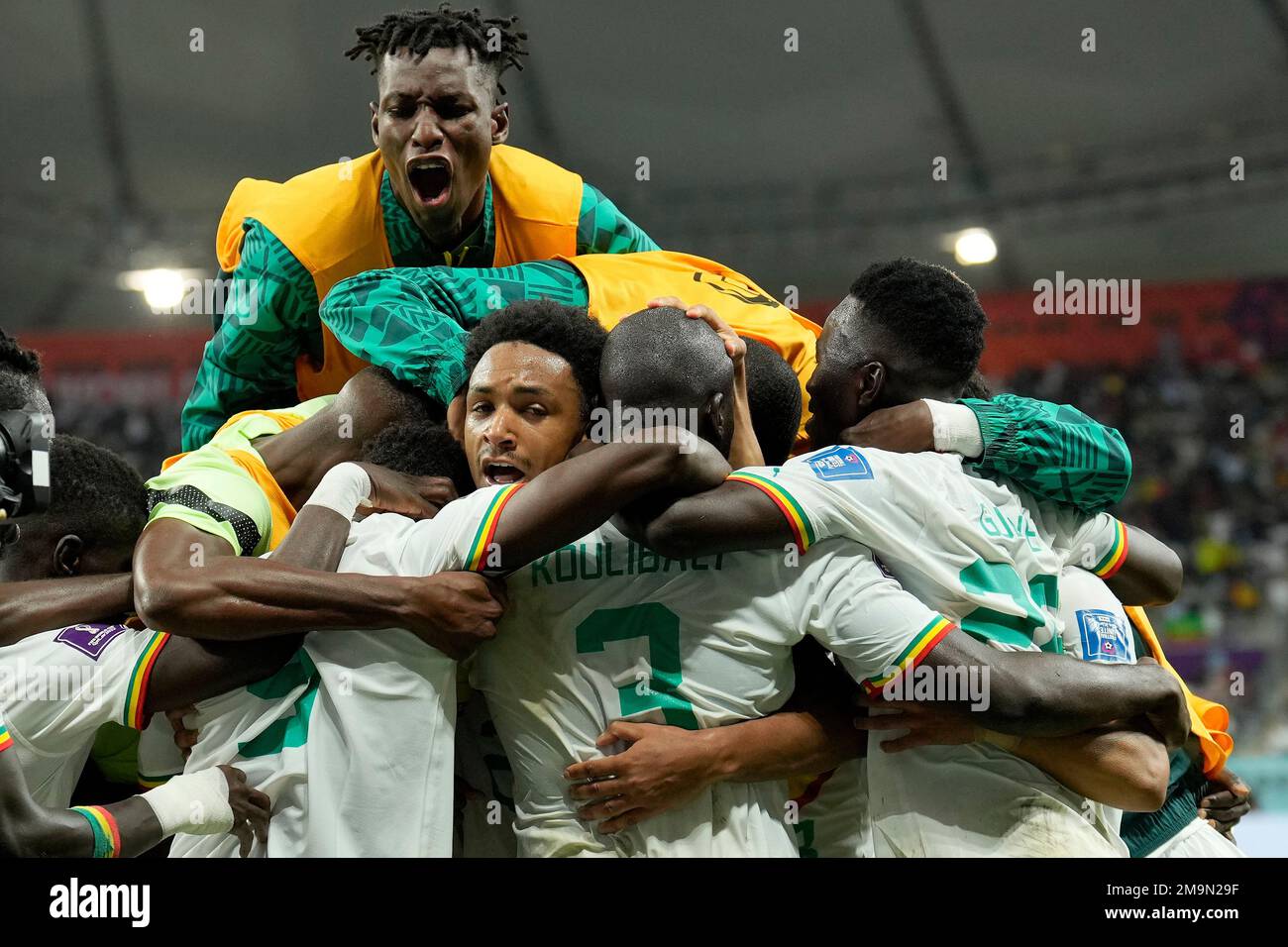 Senegal players celebrate scoring their side's second goal during the ...