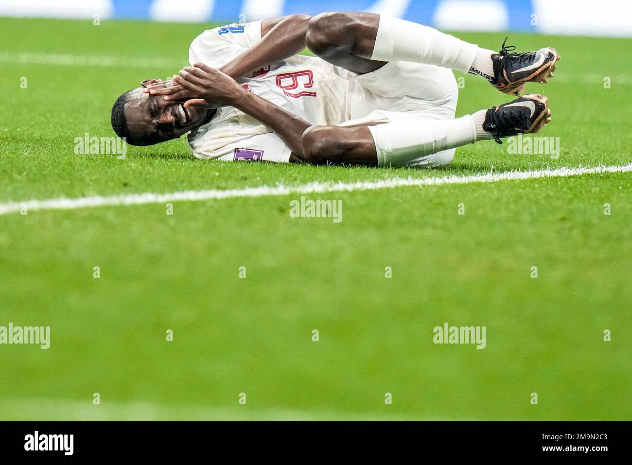 Qatar's Almoez Ali reacts during the World Cup group A soccer match ...
