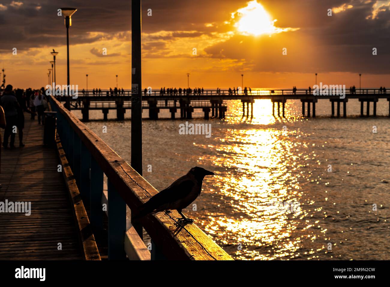 The magnificent historic Palanga Bridge on the Baltic Sea at sunset in ...