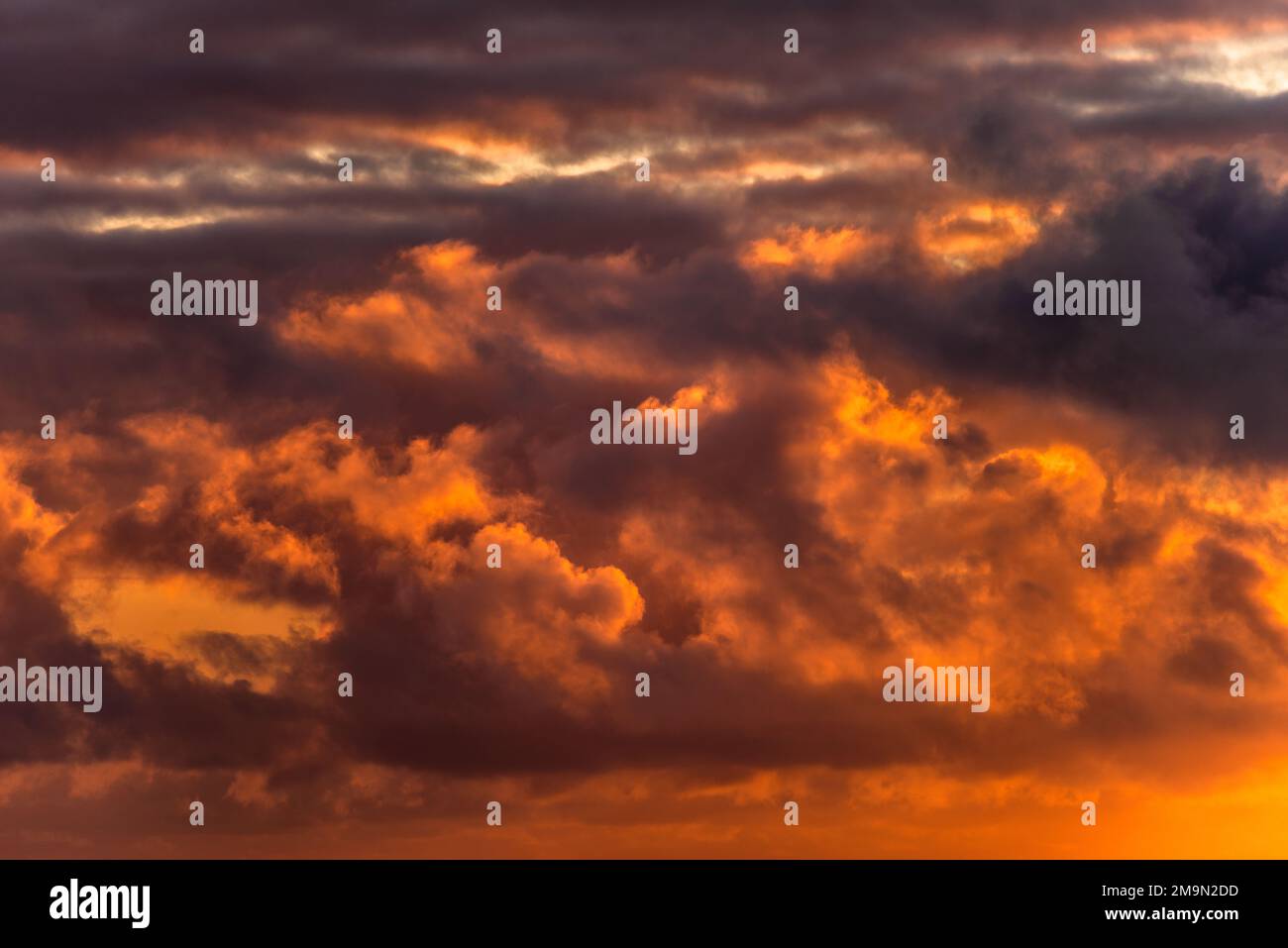 Amazing cloudy skies over the Atlantic Ocean at sunset Stock Photo - Alamy
