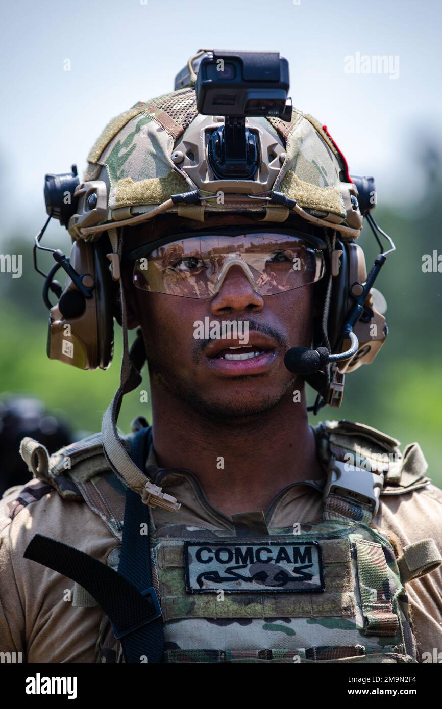 U.S. Army Sgt. Sidney Perry, a visual information specialist assigned ...