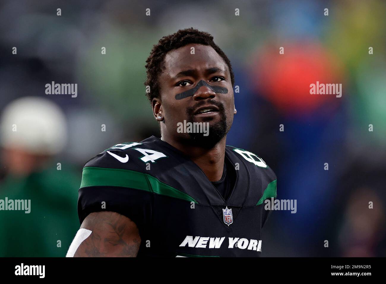 New York Jets wide receiver Corey Davis (84) walks off the field after ...