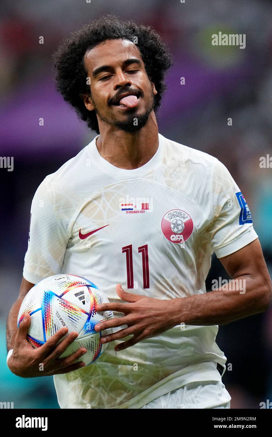 Qatar's Akram Afif gestures during a World Cup group A soccer match ...