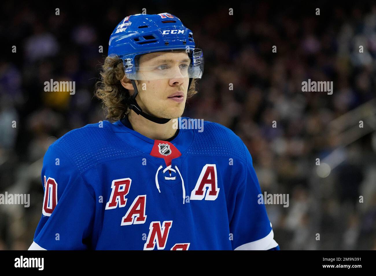 New York Rangers left wing Artemi Panarin (10) waits for a face-off in ...