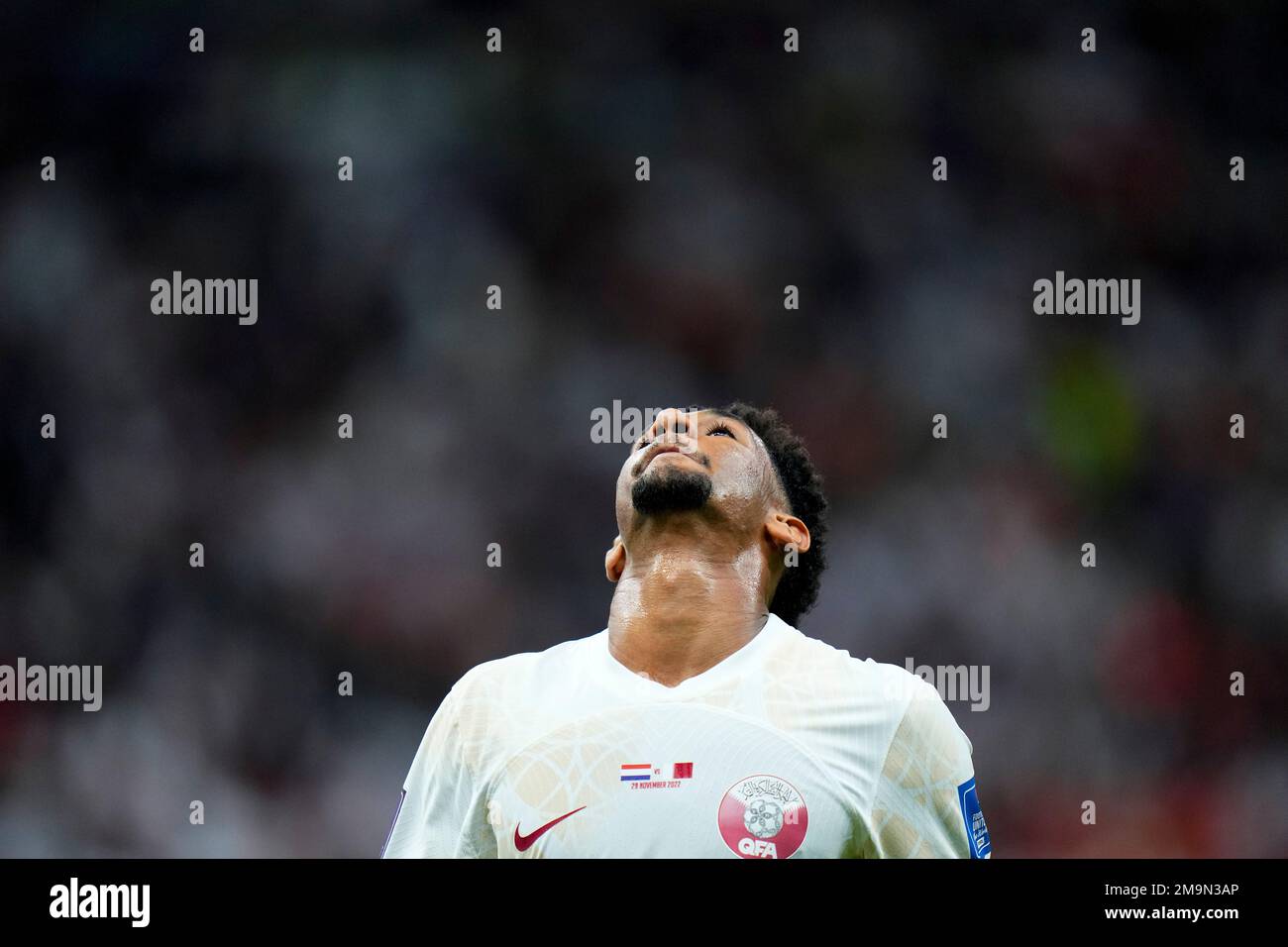 Qatar's Homam Ahmed looks up during a World Cup group A soccer match ...