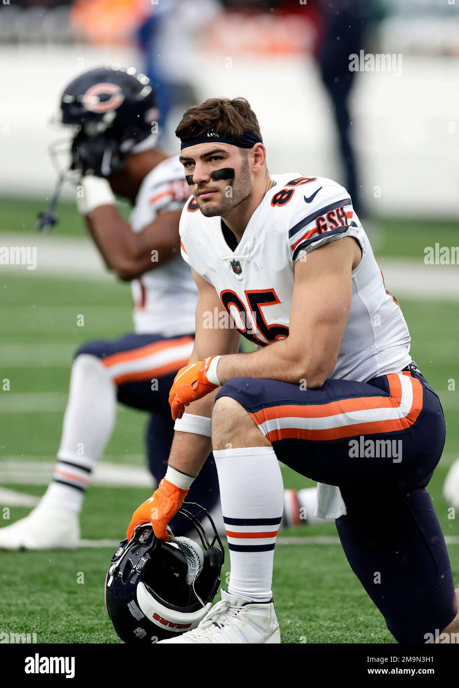 Chicago Bears tight end Cole Kmet (85) warms up before an NFL football ...