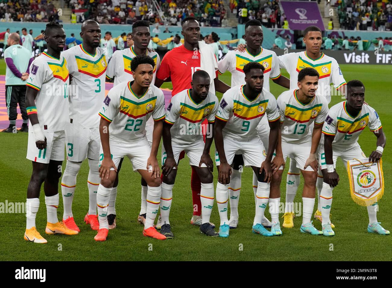 Players of Senegal pose ahead of the World Cup group A soccer match ...