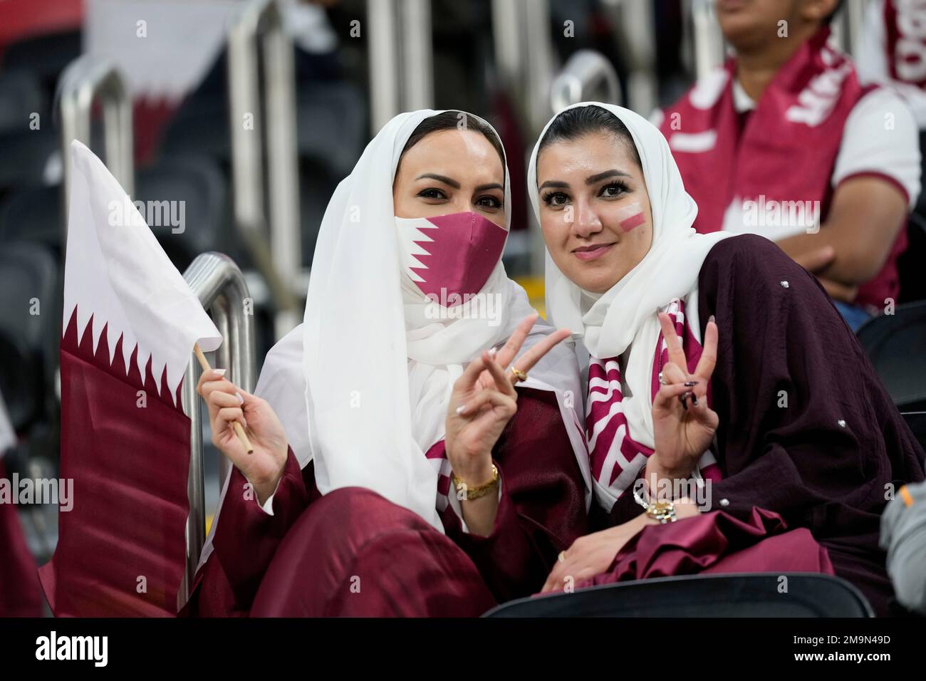 Fans pose before the World Cup group A soccer match between the ...