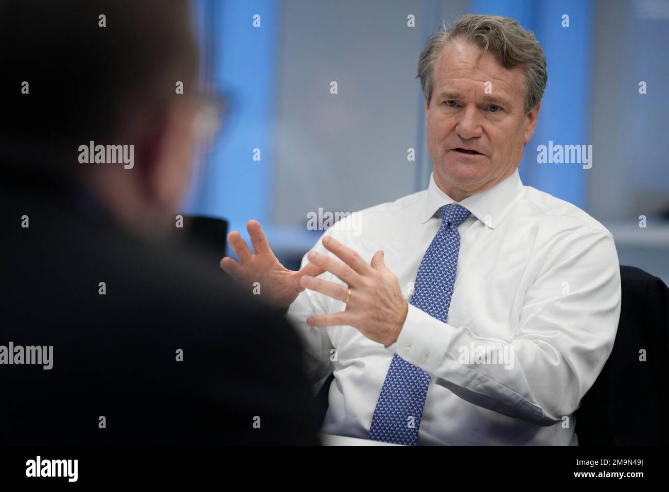 Brian Moynihan, CEO of Bank of America, talks with reporters at ...